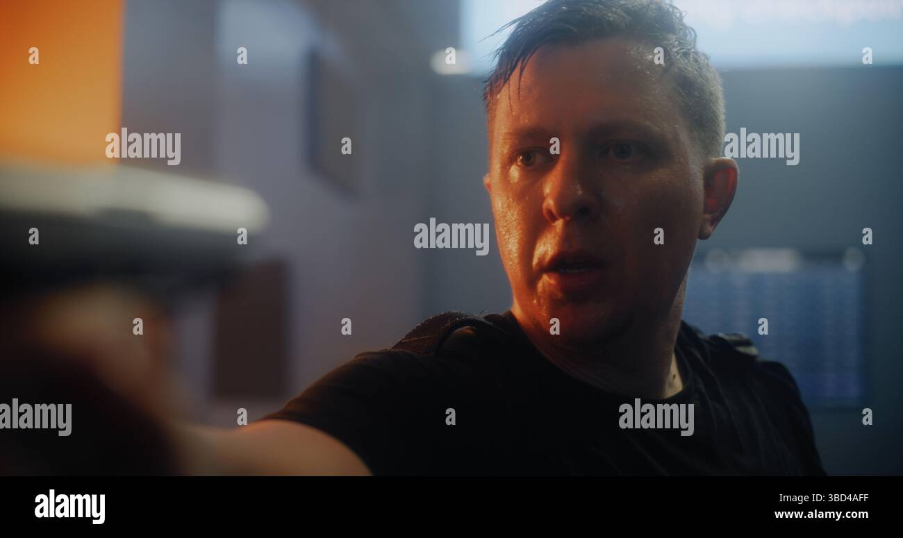 Epic Action Movie Scene: Tired Male Criminal in Black Tactical Clothing ...