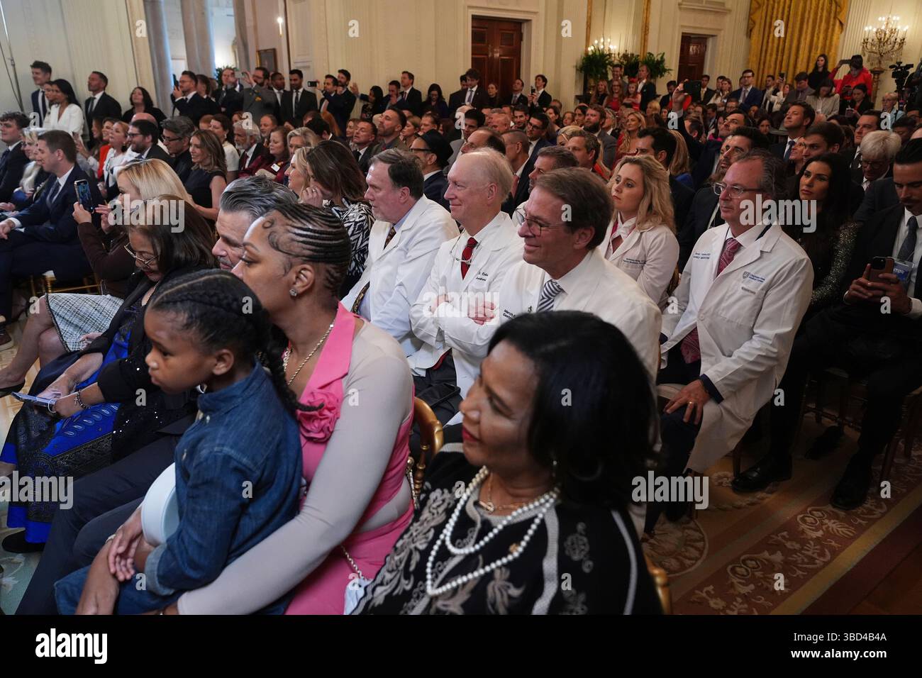 Attendees listen during a Make America Healthy Again (MAHA) Commission ...