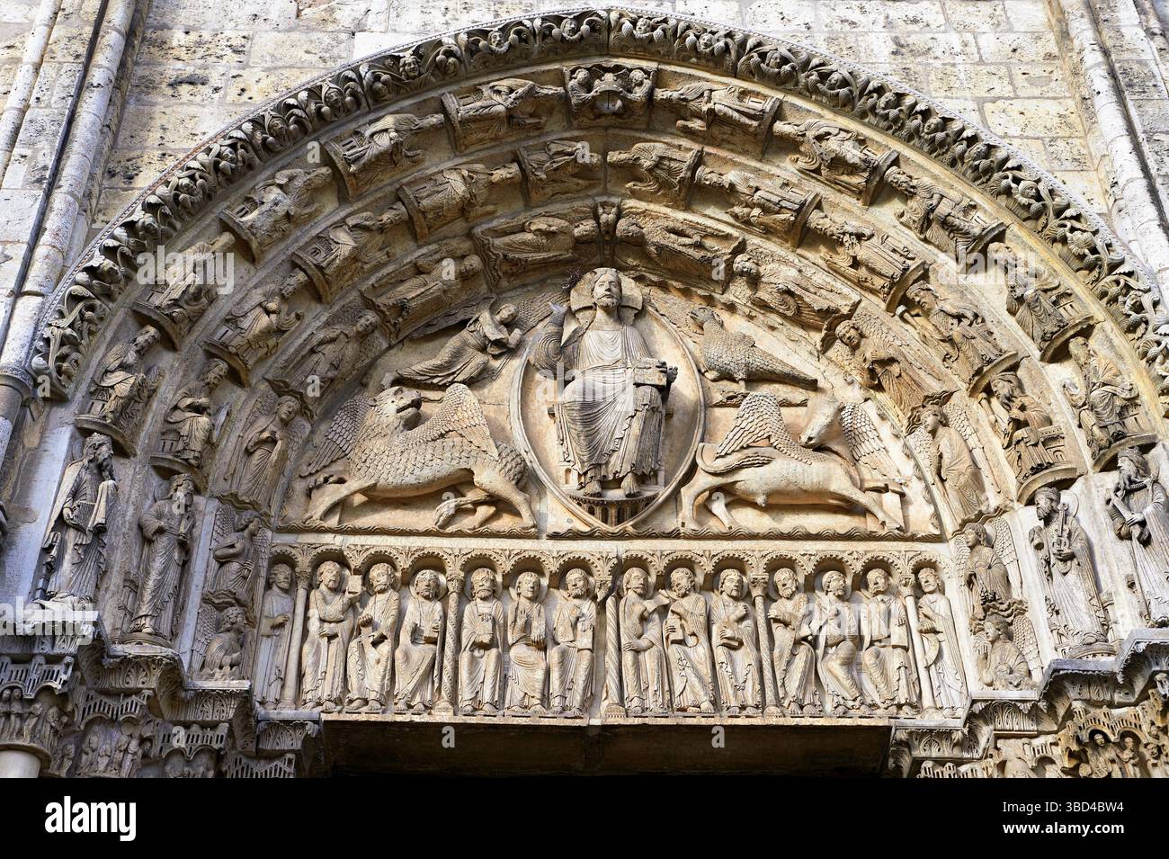Gothic sculptures of Christ Pantocrator surrounded by the four ...