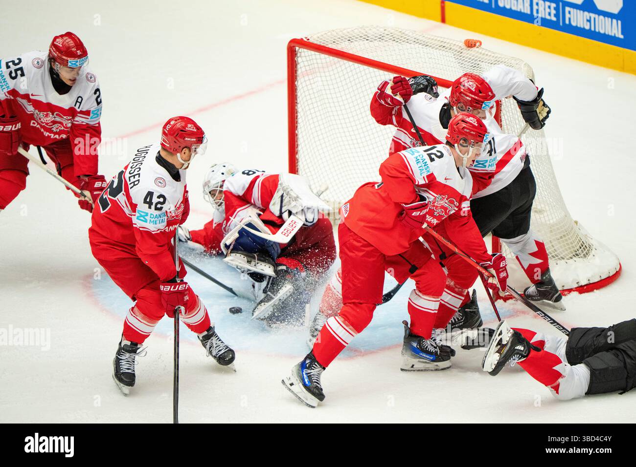 Denmark's Oliver Lauridsen, left, Phillip Bruggisser, goalkeeper Frederik Dichow, Oscar ...