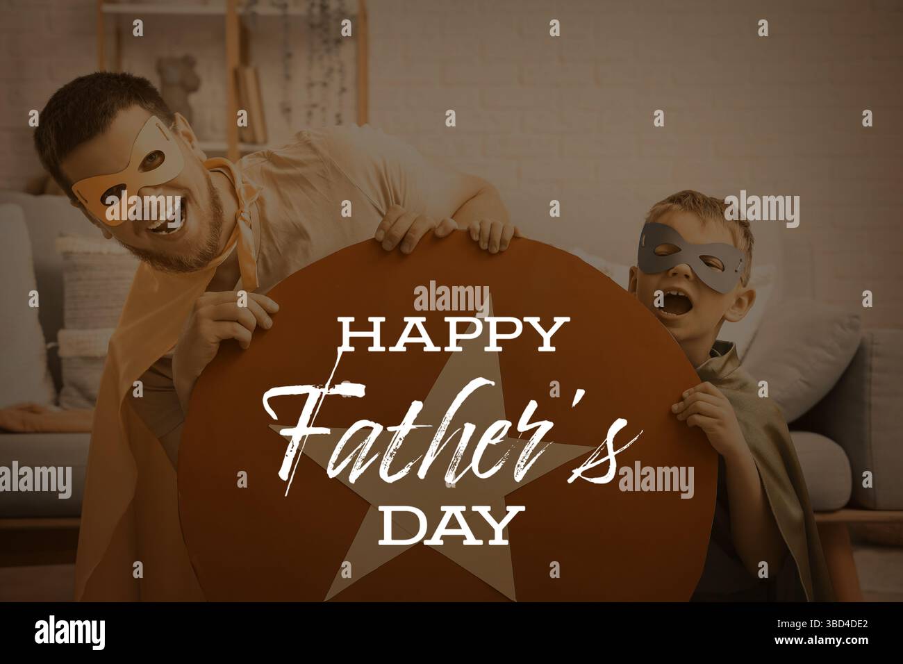 Little boy and his father in superhero costumes and with paper shield ...