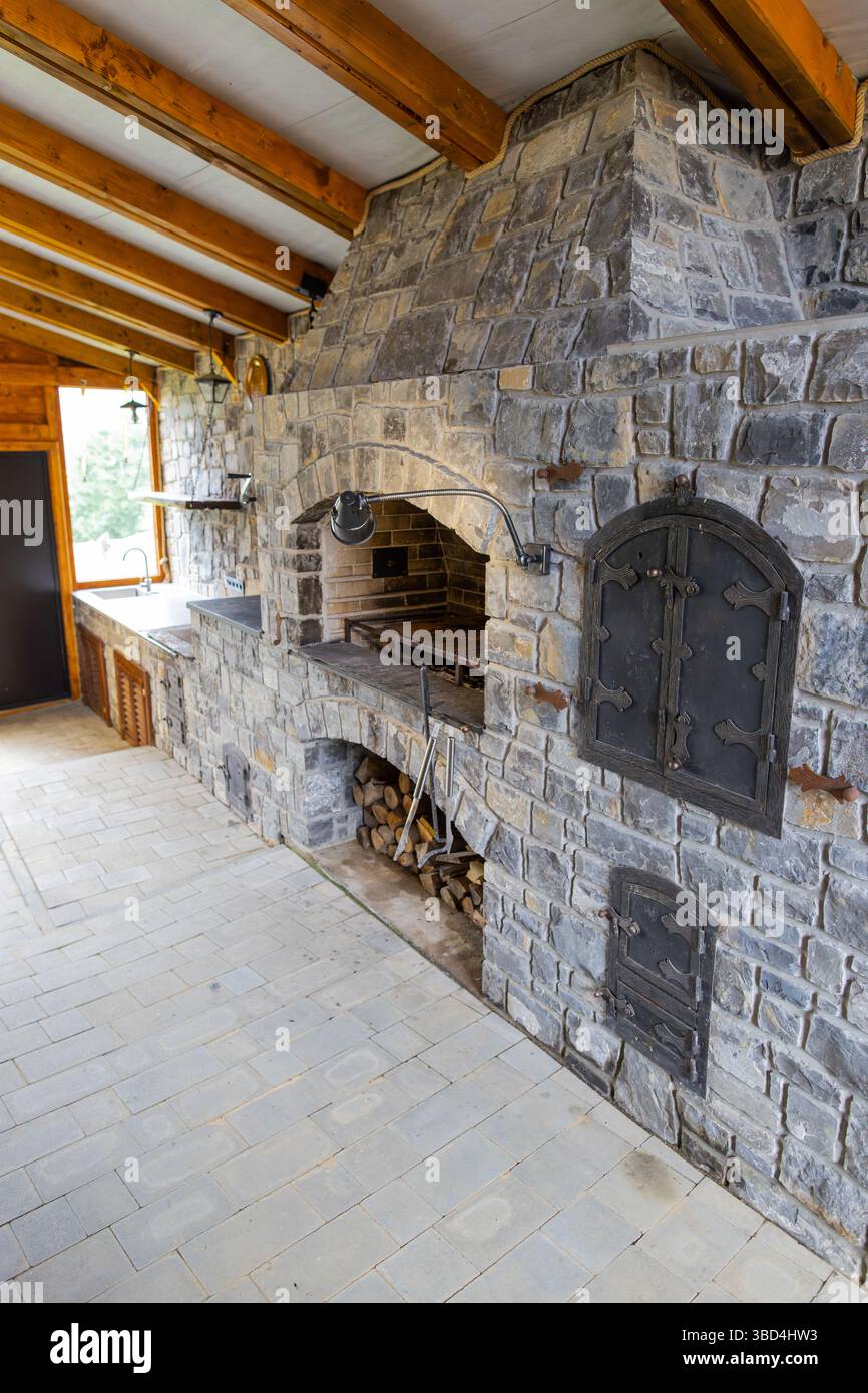 Stone barbecue firewood, open brick oven for cooking kebabs and other ...