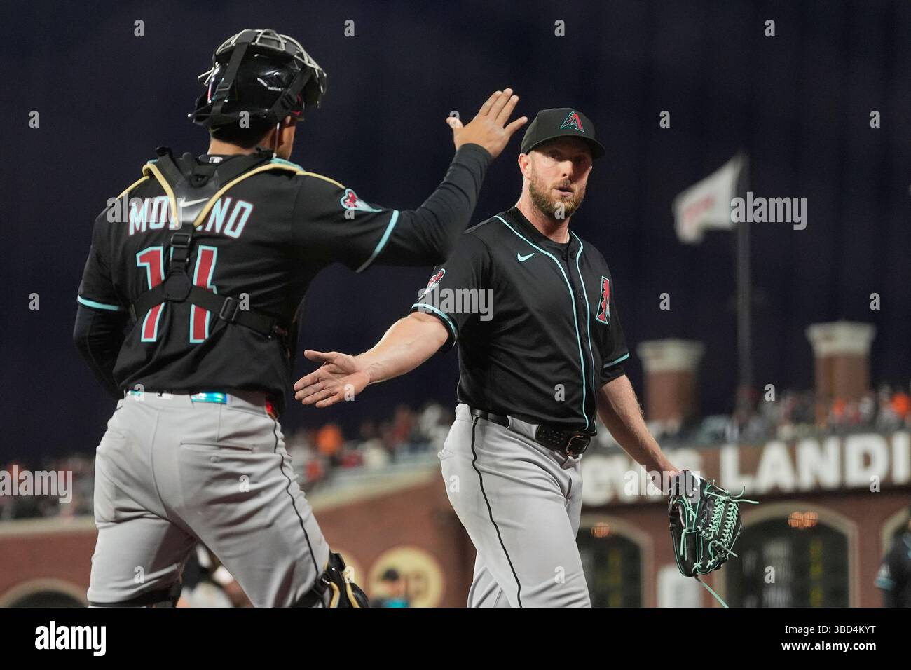 Arizona Diamondbacks catcher Gabriel Moreno, left, and pitcher Merrill ...