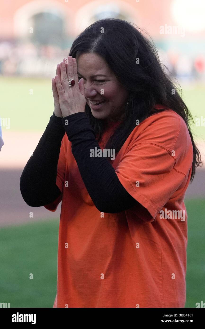 Shannon Lee, daughter of Bruce Lee, gestures before a baseball game ...