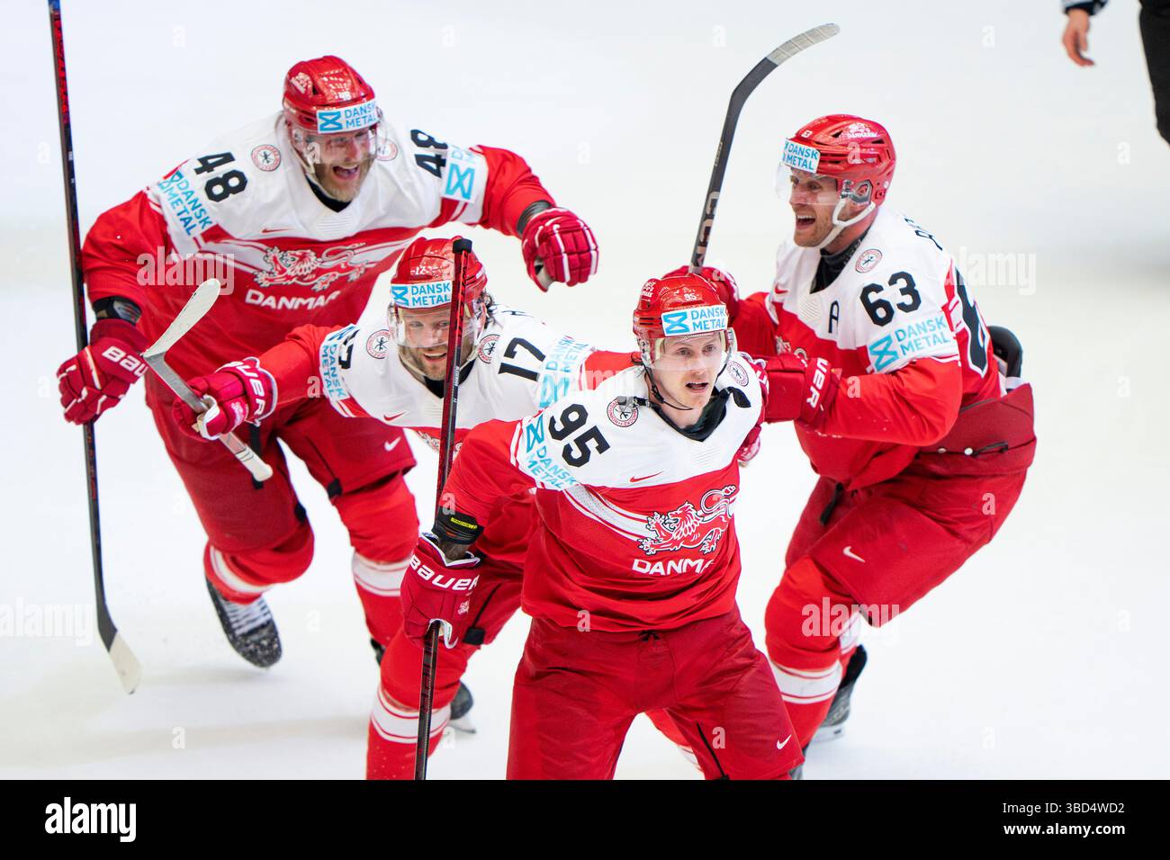 Denmark's Nick Olesen (95) celebrates with teammates after scoring the ...