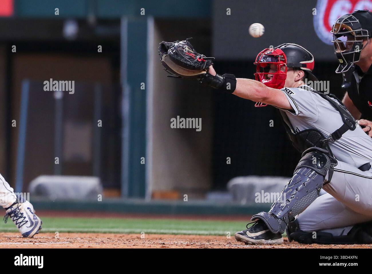 Arlington, Texas, USA. 22nd May, 2025. A foul tipped ball travels over ...