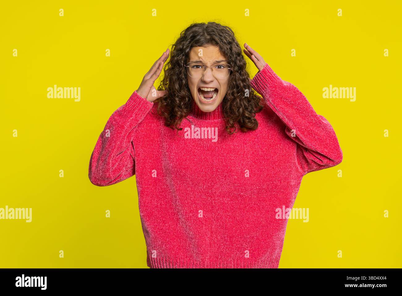 Irritated angry Caucasian young teenager girl screams from stress ...