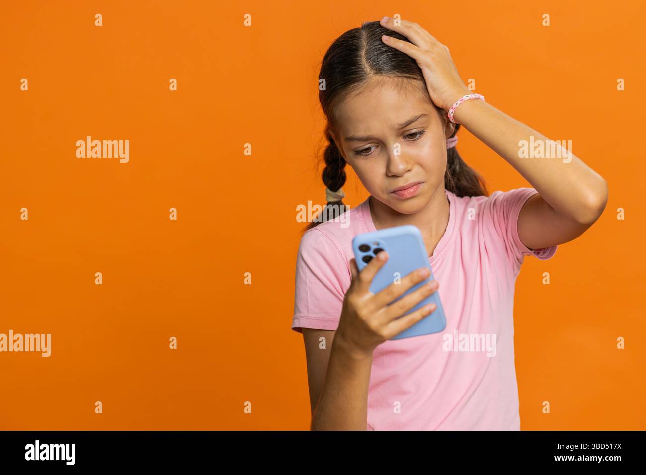 Upset sad preteen child girl kid use smartphone typing browsing, play ...