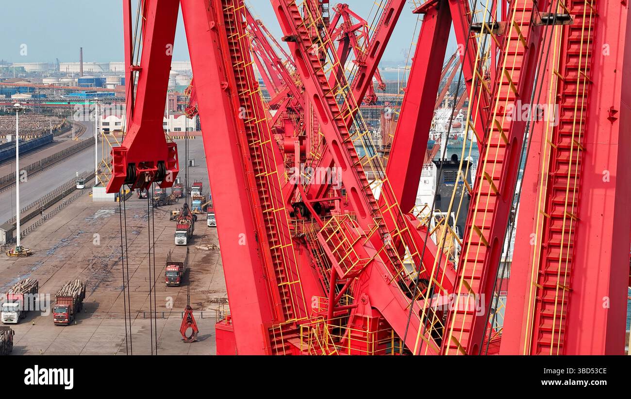 RIZHAO, CHINA - MAY 22, 2025 - A cargo ship carrying timber was ...