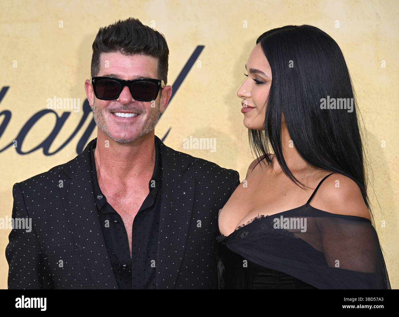Cannes, France. May 22nd, 2025. Robin Thicke and April Love Geary ...