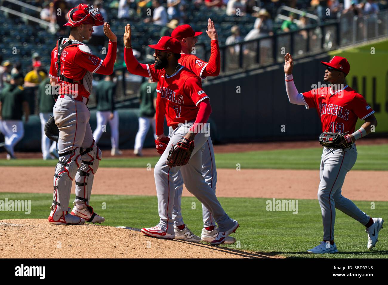 Los Angeles Angels players celebrate their team's win following a ...