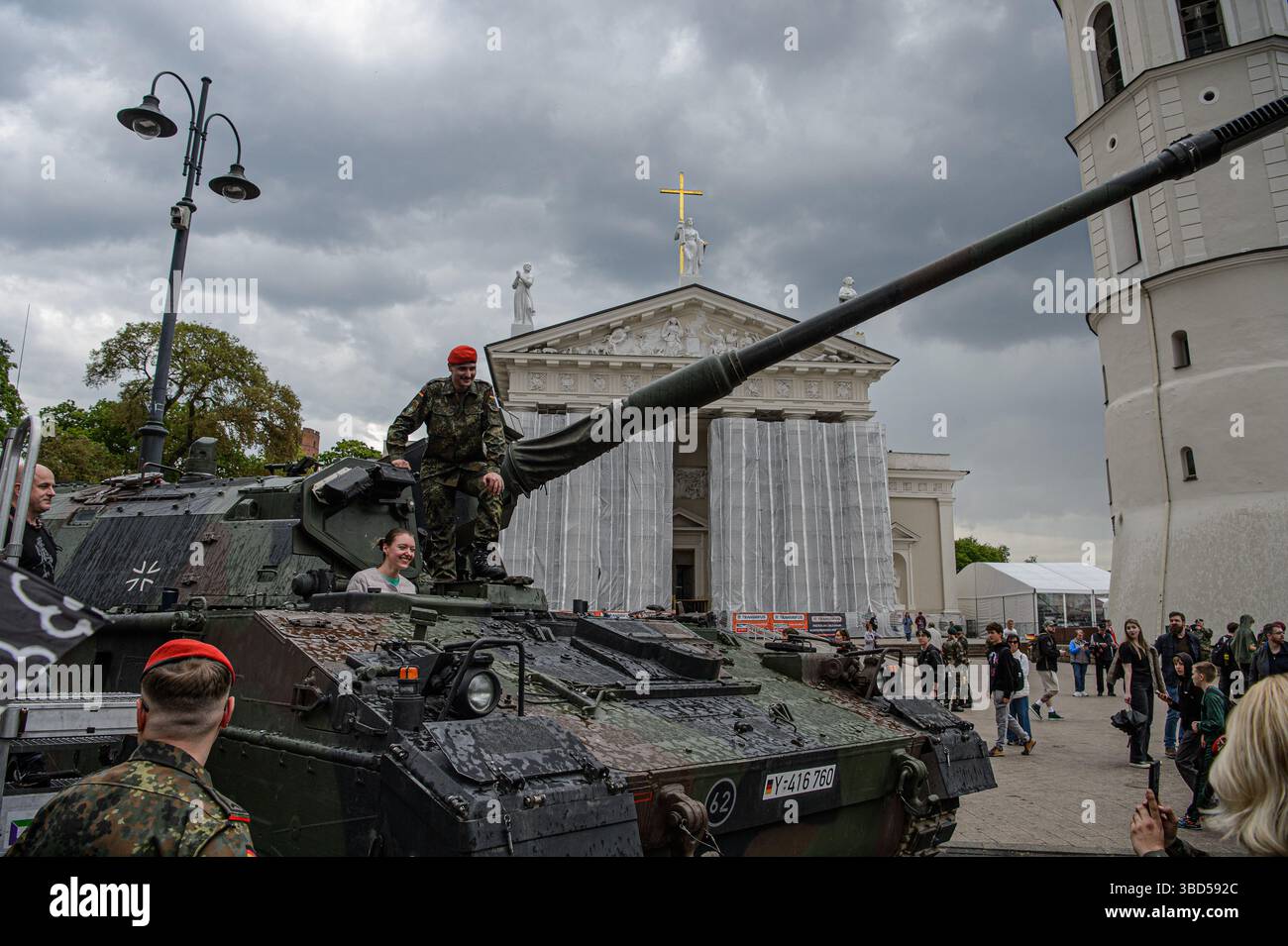 Passers-by climb on a Bundeswehr PzH 2000 self-propelled howitzer ...