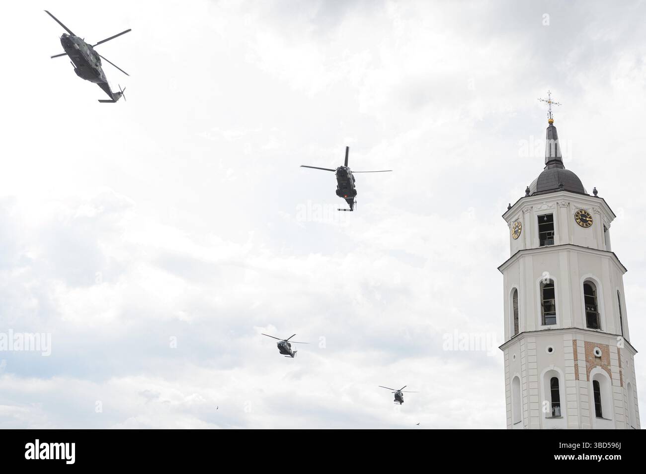 Helicopters fly over the Cathedral Square during the ceremony of German ...