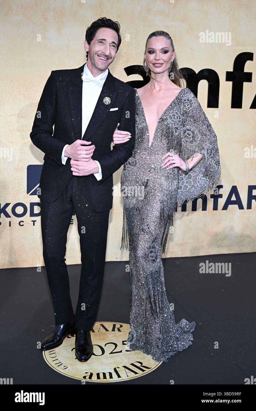 Adrian Brody and Georgina Chapman attend the amfAR gala Cannes 2025 ...