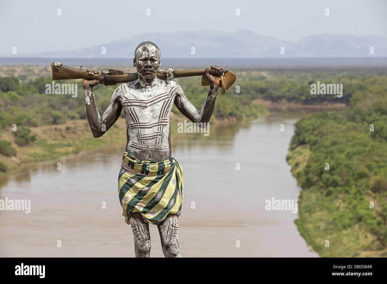 Painted black man with old LeeÂ–Enfield bolt-action army rifle of the ...