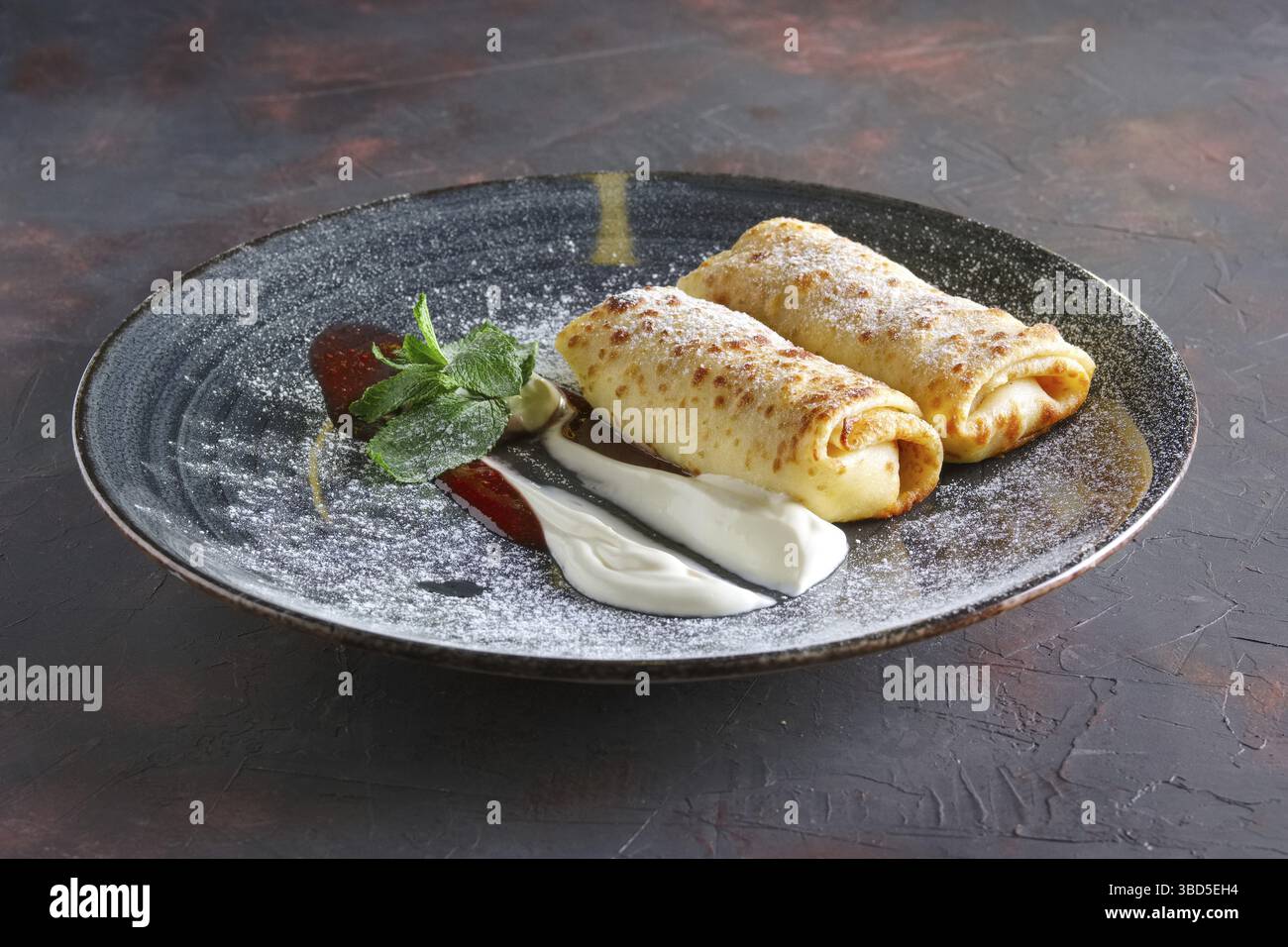 Thin pancakes with curd and sour cream Stock Photo - Alamy