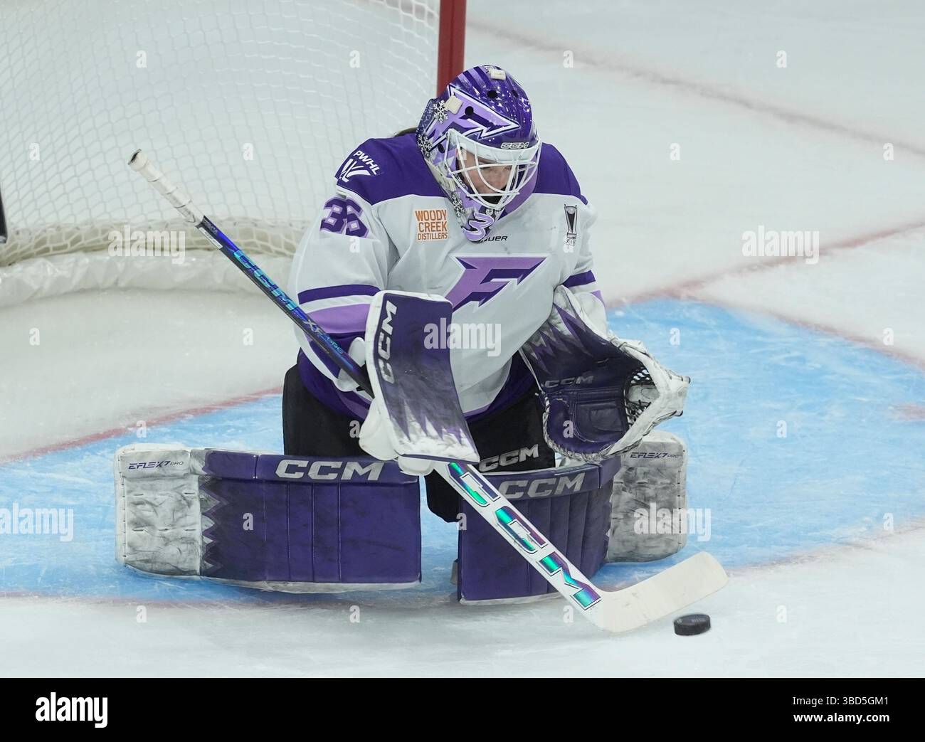 Minnesota Frost goalie Maddie Rooney makes a save against the Ottawa ...