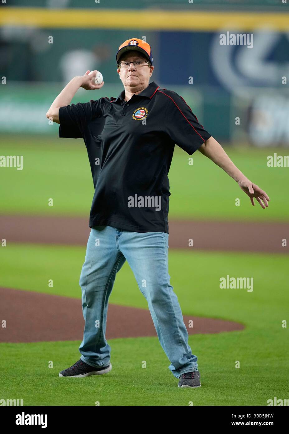 U.S. Army Staff Sergeant Michelle Hague throws the first pitch at a ...