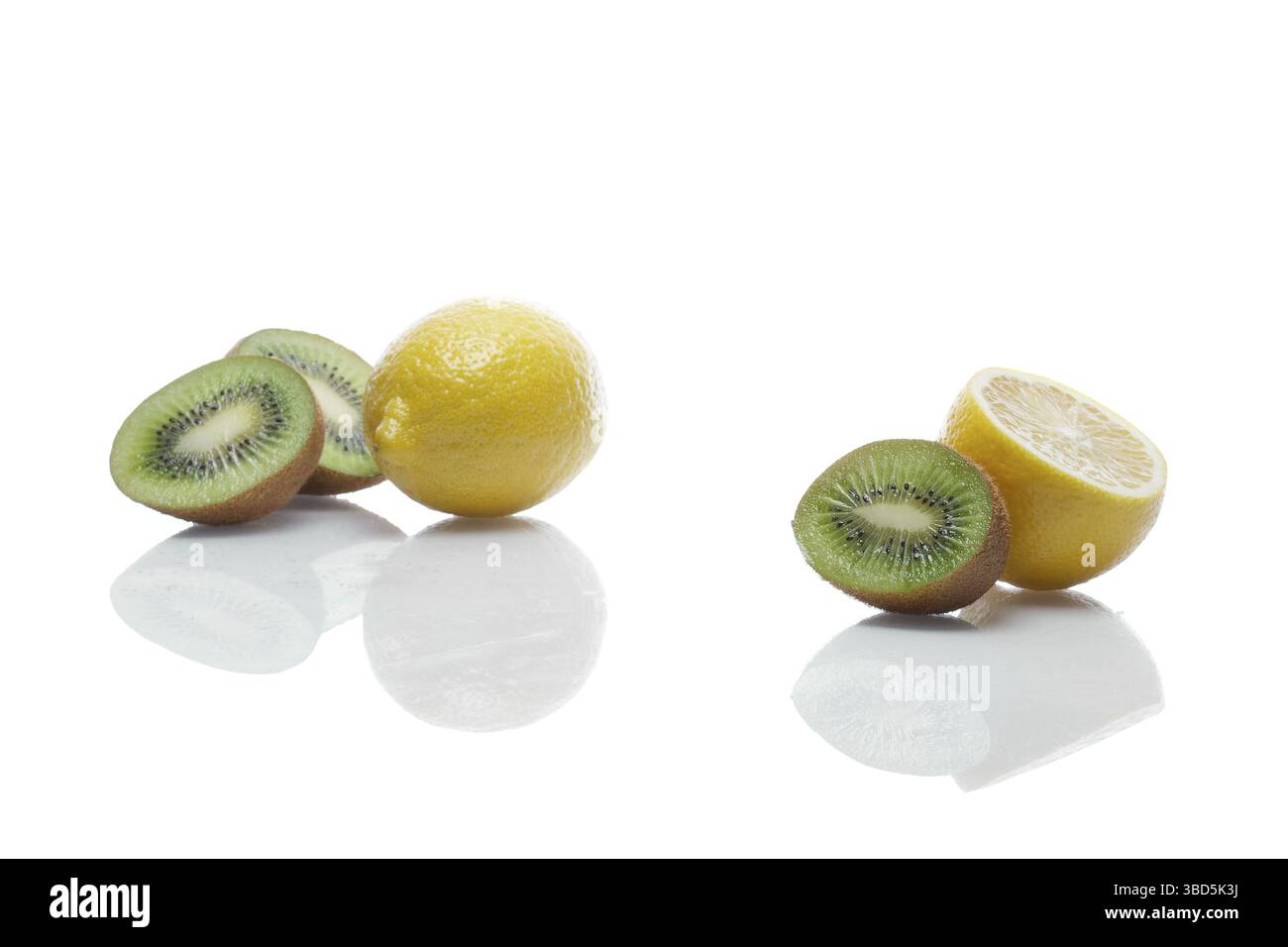 Lemons on yellow table Cut Out Stock Images & Pictures - Alamy