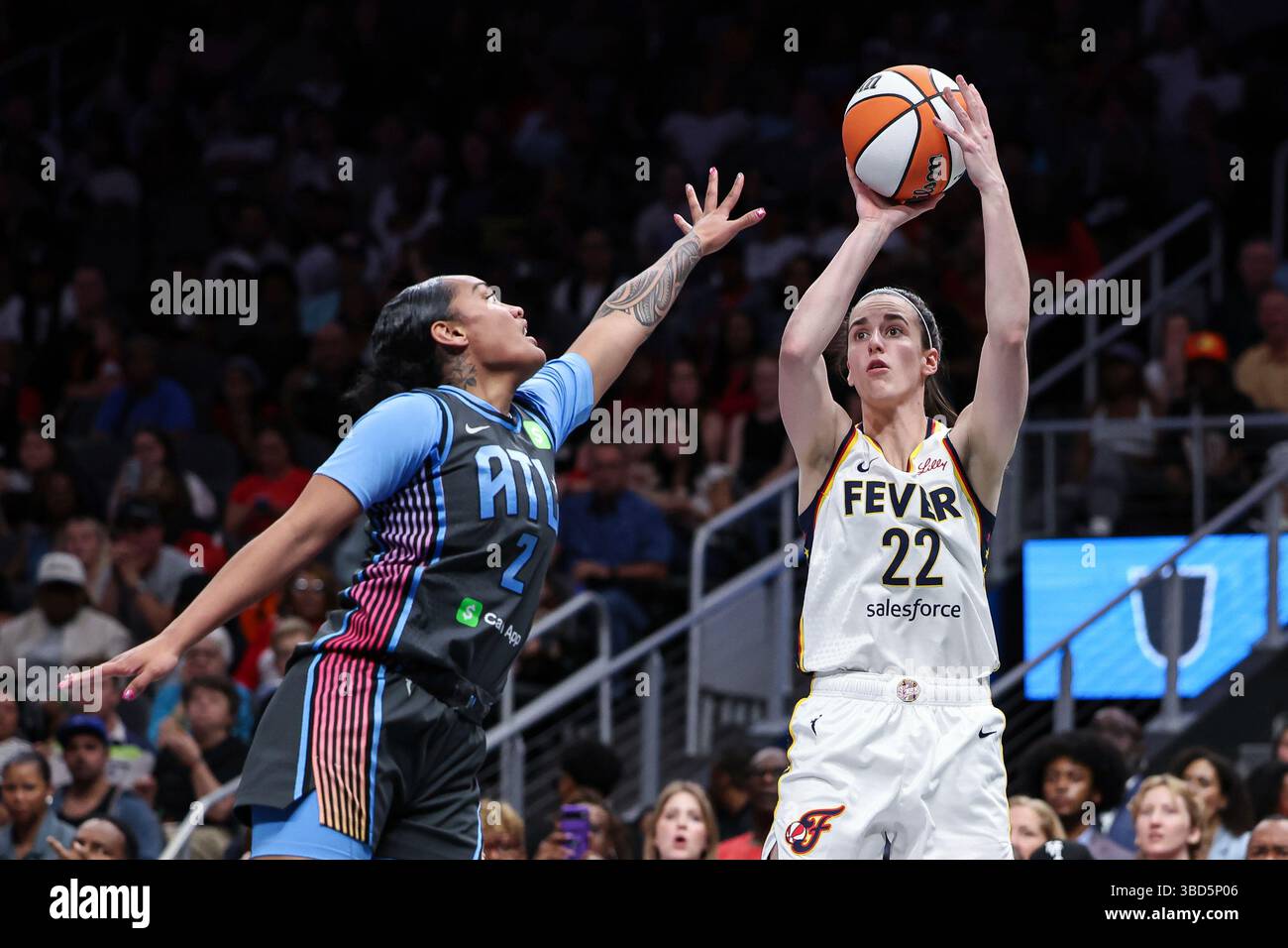 Indiana Fever guard Caitlin Clark (22) attempts a shot in the first ...