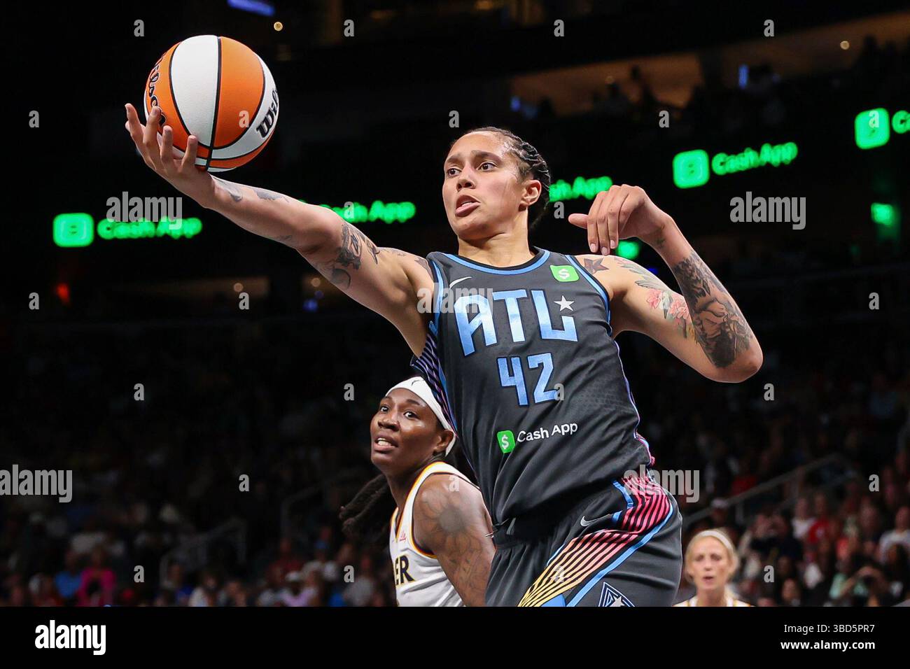Atlanta Dream center Brittney Griner (42) grabs a rebound in the first ...