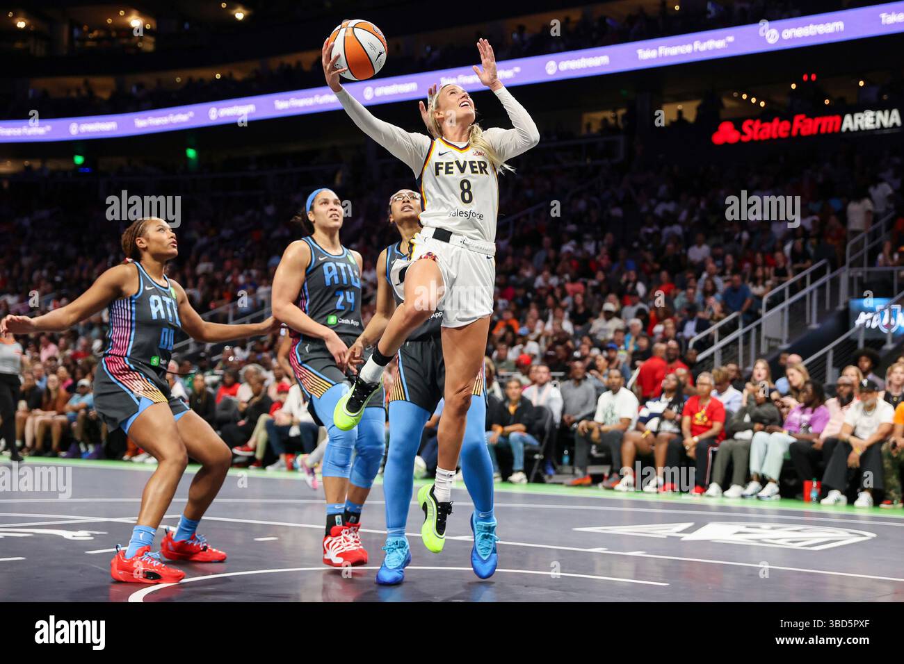 Indiana Fever guard Sophie Cunningham (8) attempts a shot in the first ...
