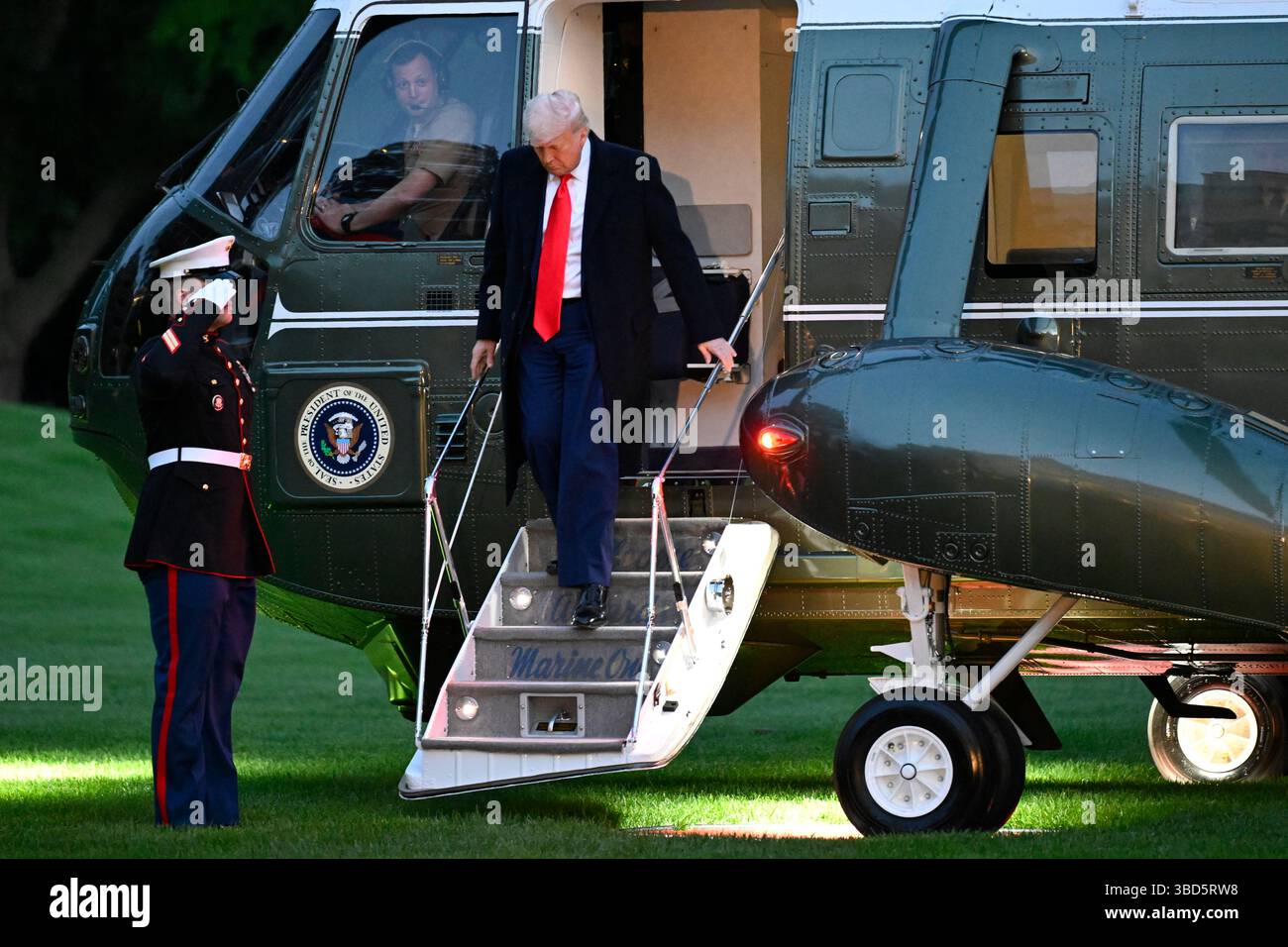 President Donald Trump arrives on the South Lawn of the White House ...