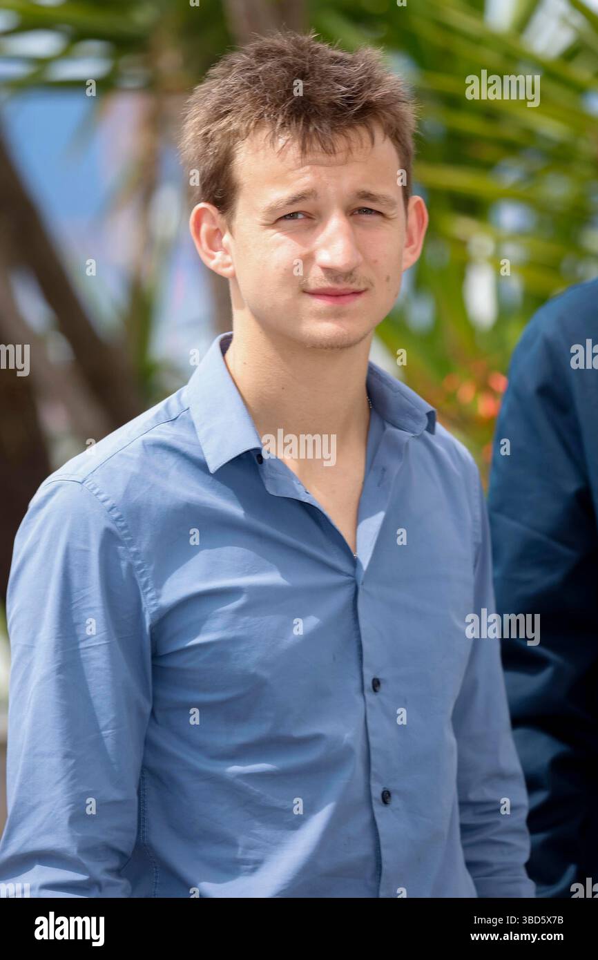 Timi-Joy Marbot poses at the photocall of 'L'Homme Qui A Vu L'Ours Qui ...