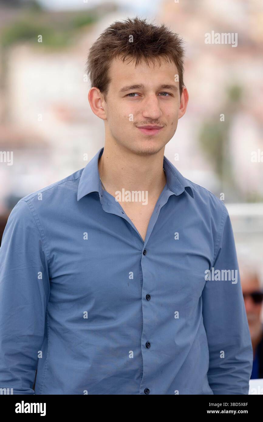 Timi-Joy Marbot poses at the photocall of 'L'Homme Qui A Vu L'Ours Qui ...