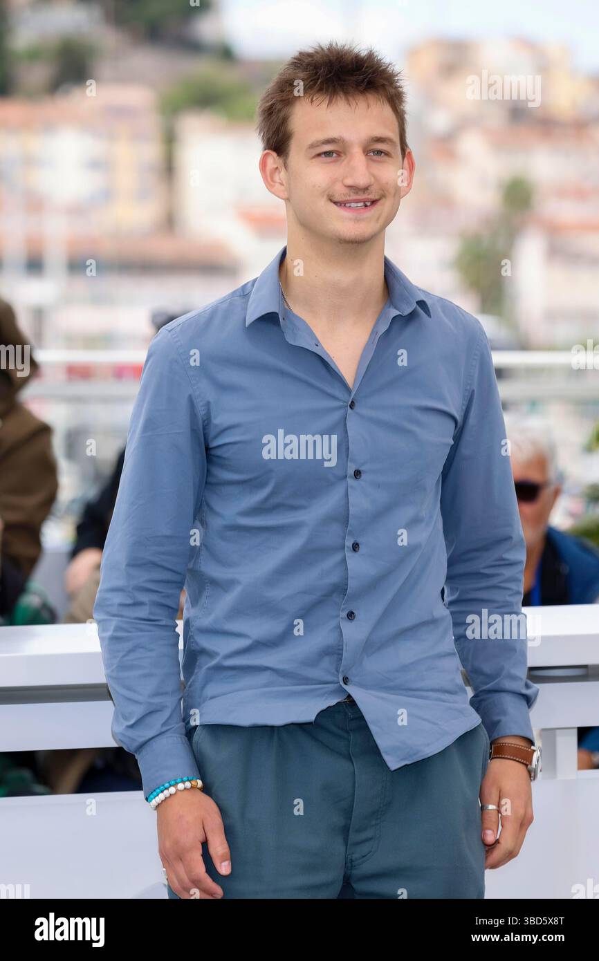 Timi-Joy Marbot poses at the photocall of 'L'Homme Qui A Vu L'Ours Qui ...