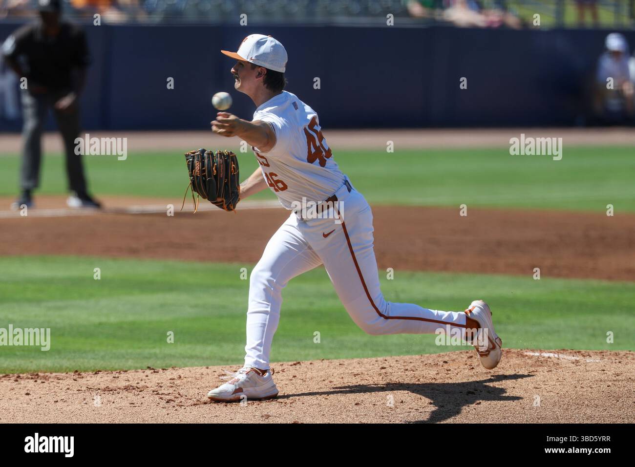 HOOVER, AL - MAY 22: Texas pitcher Ethan Walker (46) pitches the ball ...