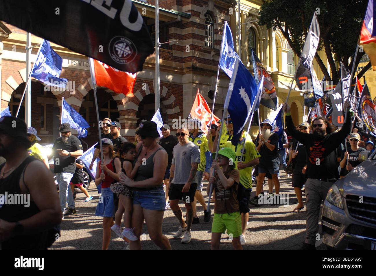 March by (CFMEU) members, protesting the LNP government’s cancellation ...