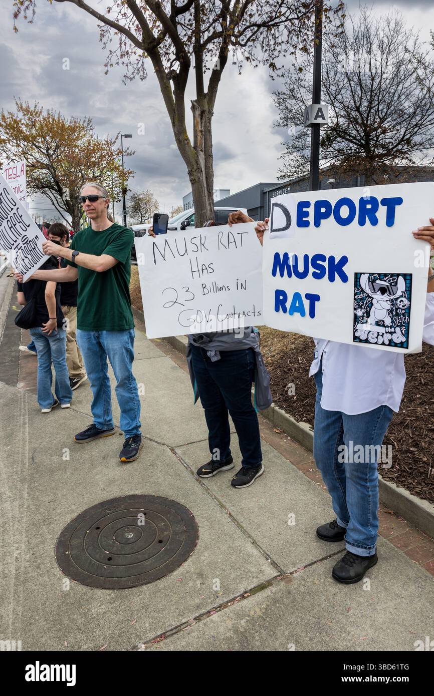Duluth, GA / USA - March 29, 2025: Protesters display anti-Elon Musk ...