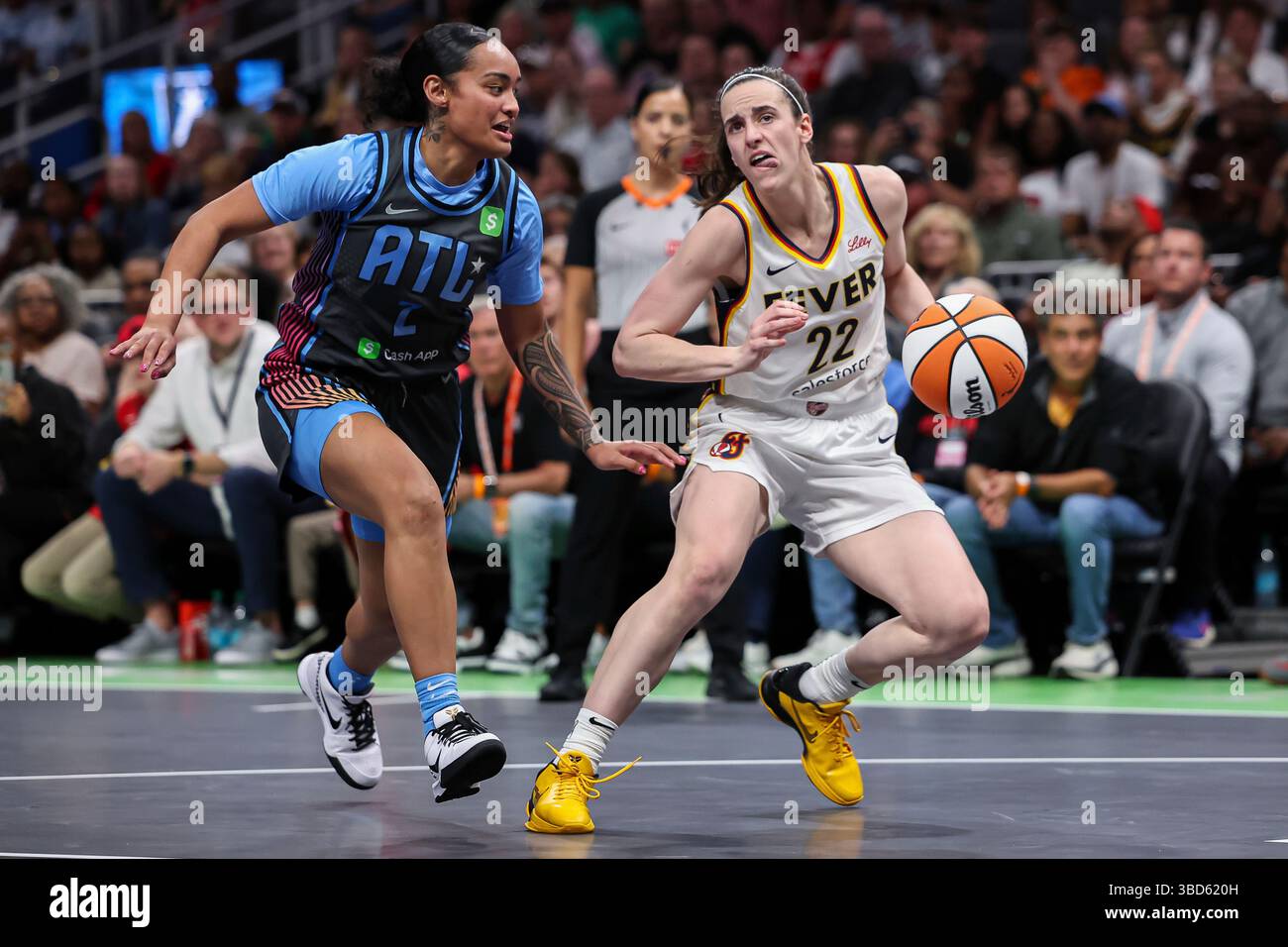 Indiana Fever guard Caitlin Clark (22) creates space against Atlanta ...