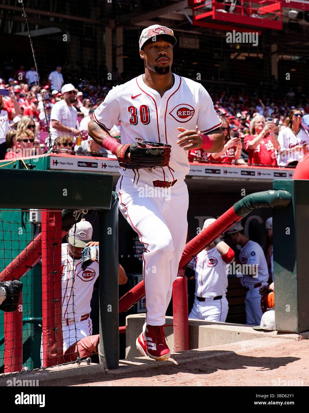 Cincinnati Reds' Will Benson (30) leaves the dugout during the first ...