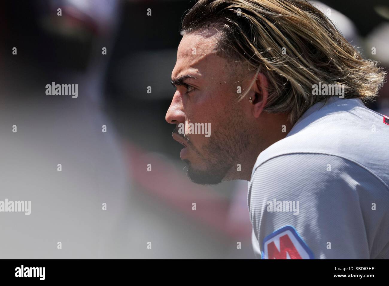Cleveland Guardians' Gabriel Arias looks on from the dugout during a ...