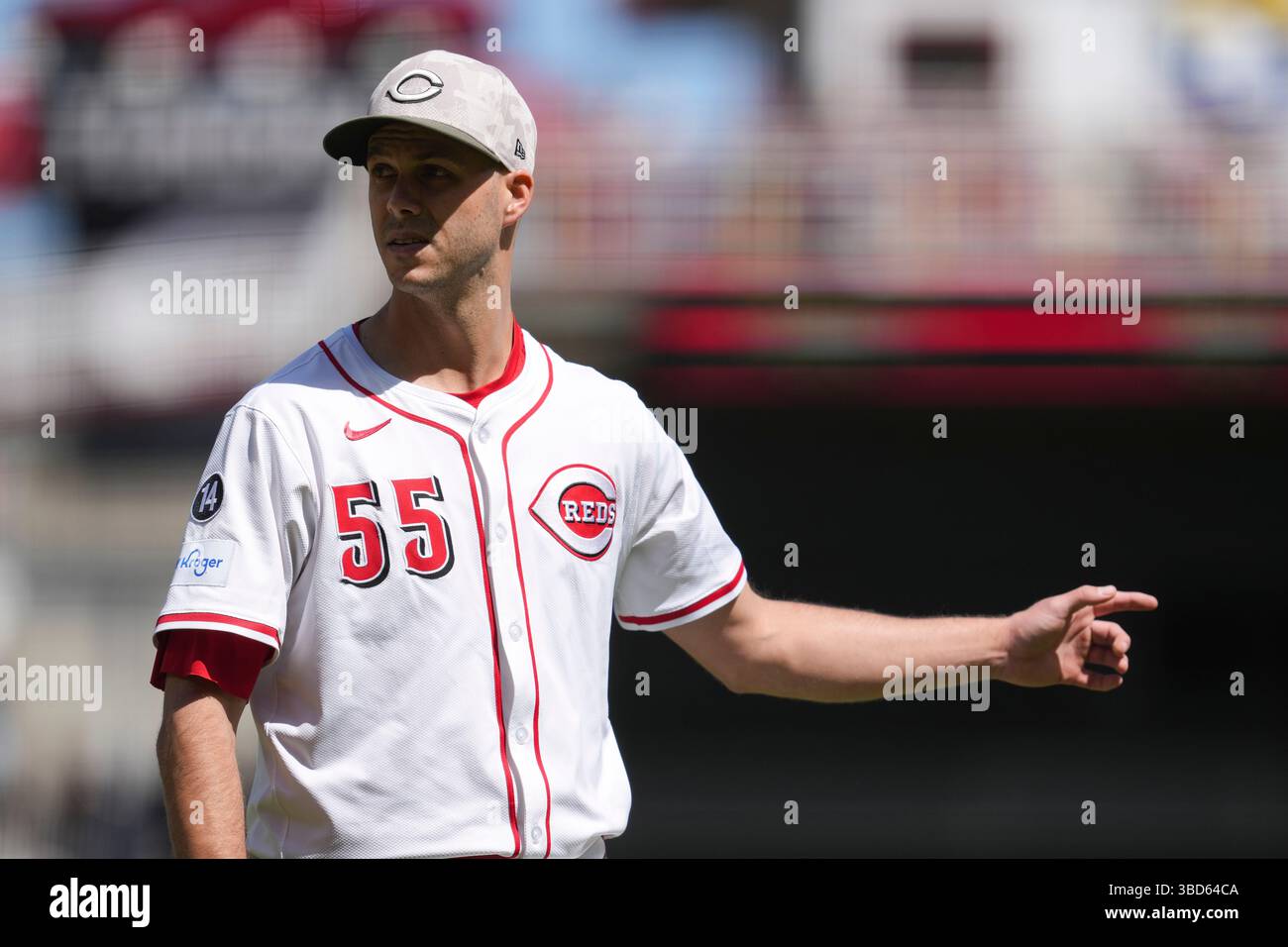 Cincinnati Reds pitcher Taylor Rogers (55) gestures during a baseball ...