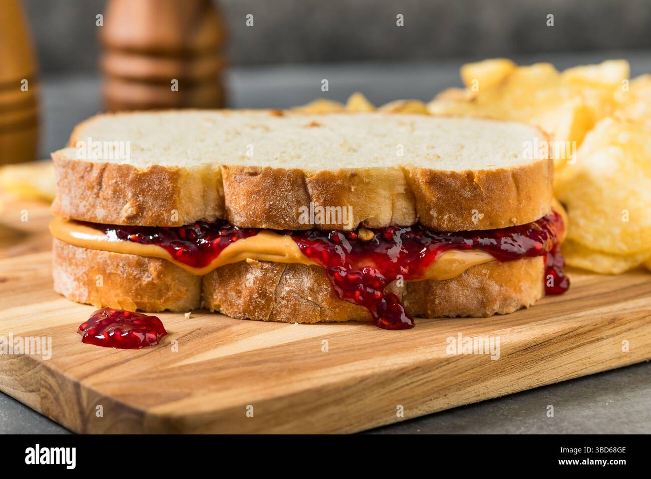 American Homemade Peanut Butter and Jelly Sandwich with Chips Stock ...