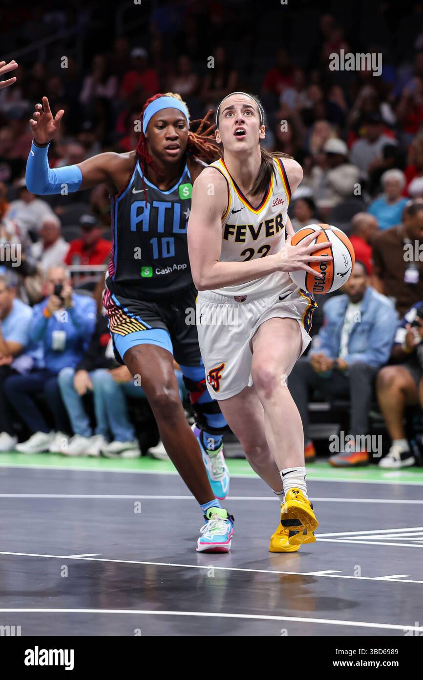 Indiana Fever guard Caitlin Clark (22) drives to the basket against ...