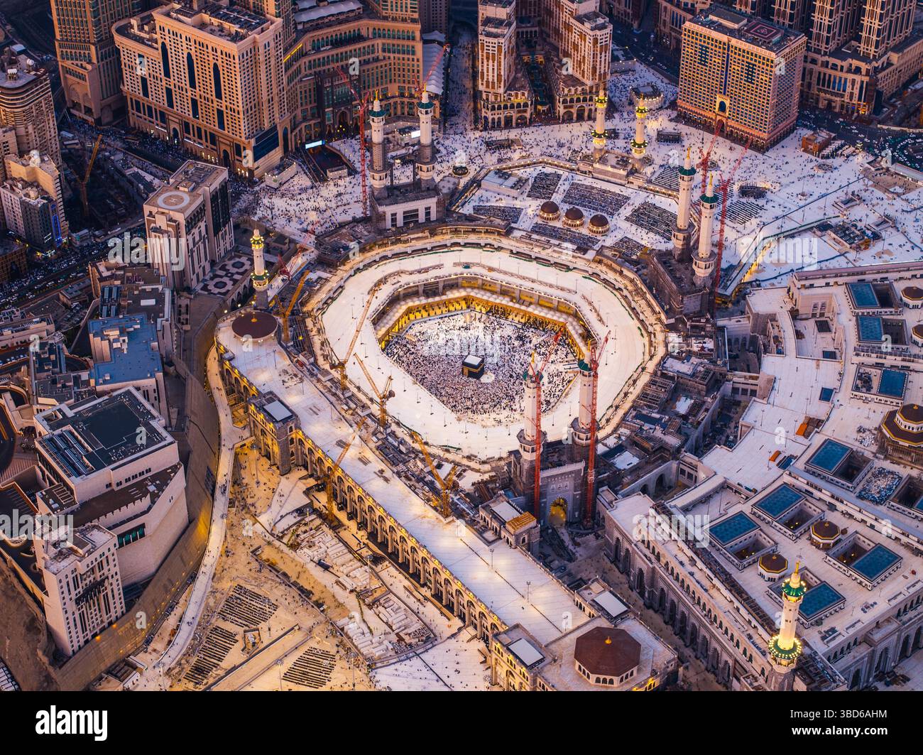 Aerial view showing crowds of pilgrims gathered around the Kaaba in the ...