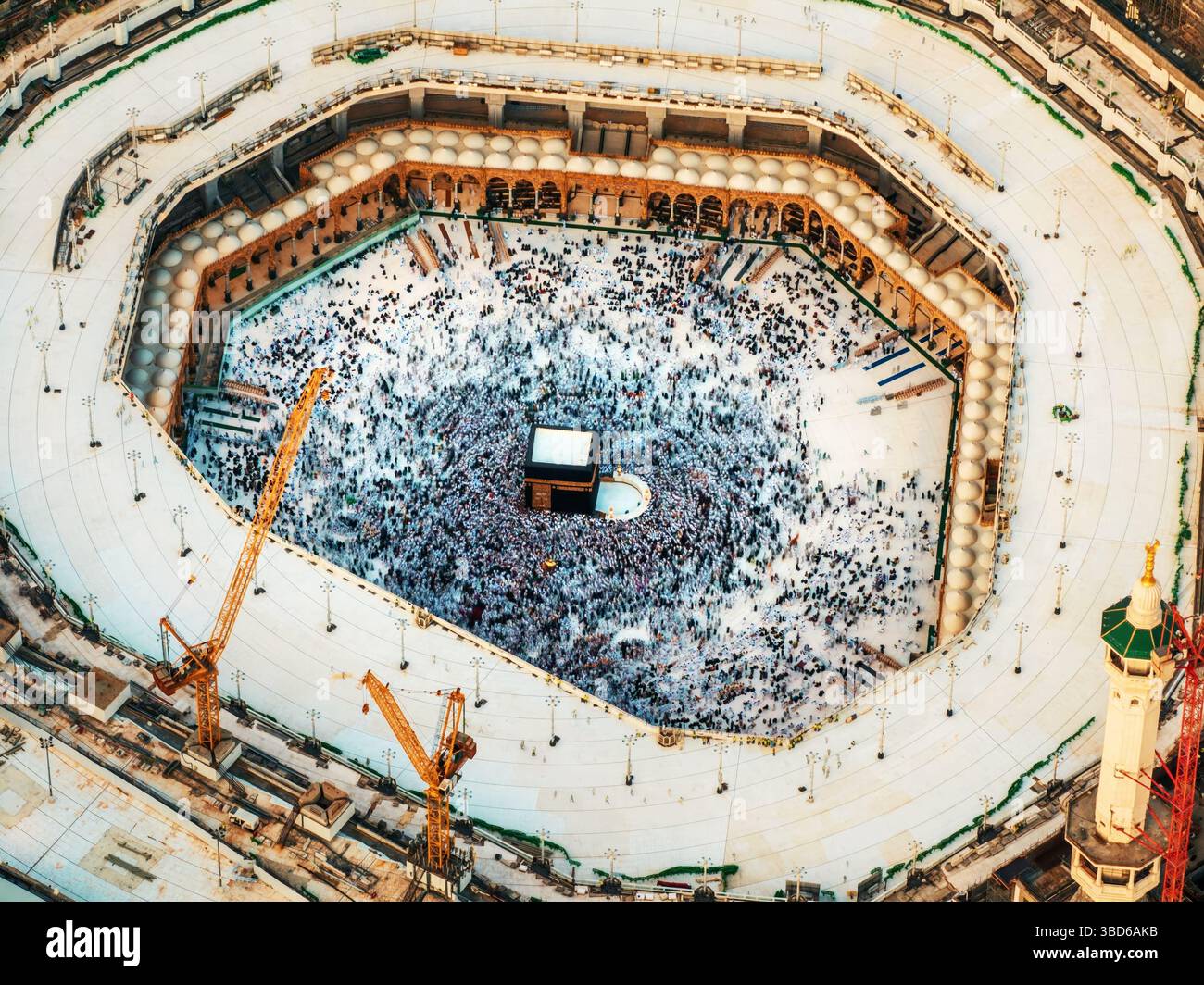 Aerial view showing crowds of pilgrims gathered around the Kaaba in the ...