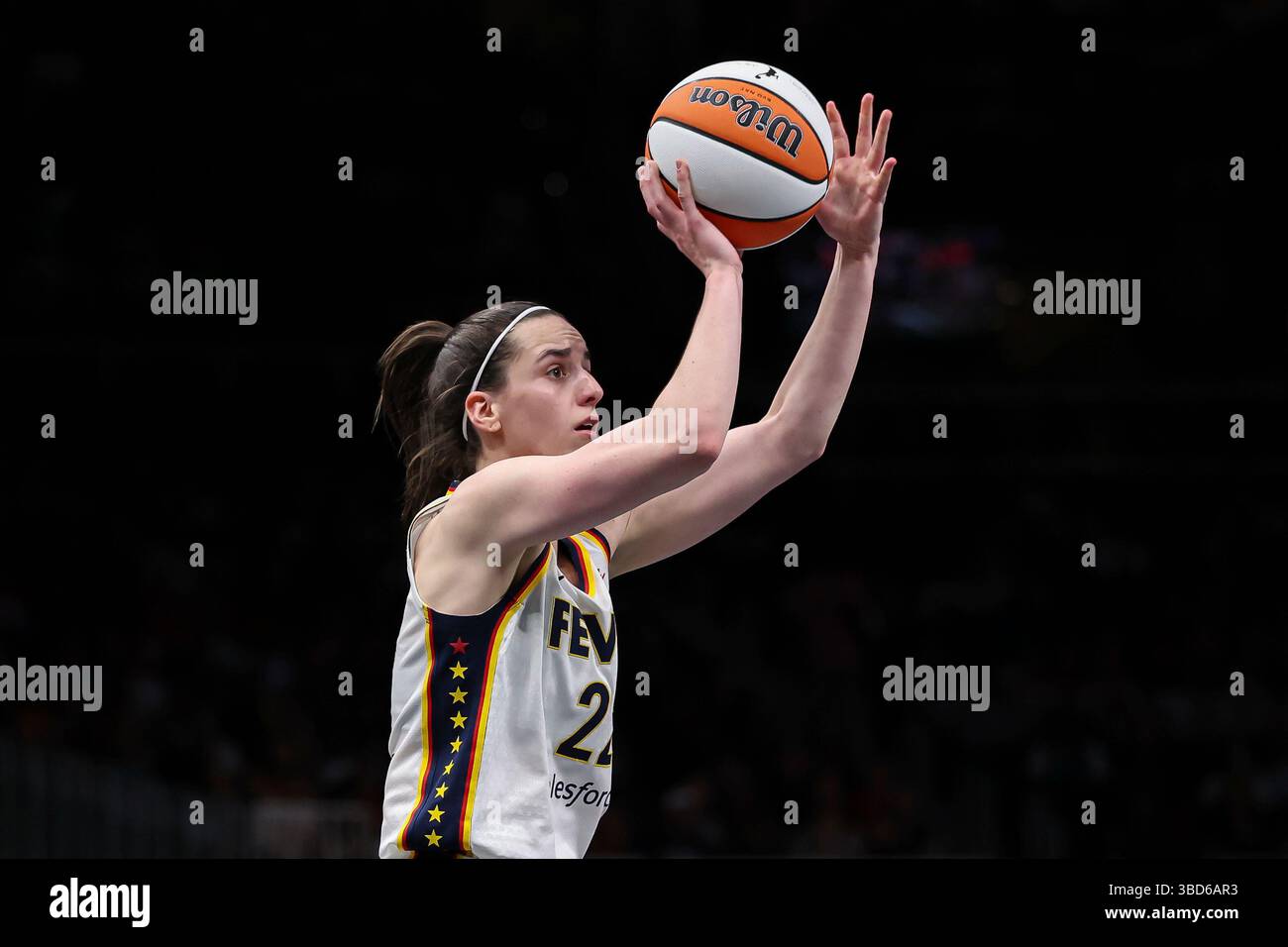 Indiana Fever guard Caitlin Clark (22) shoots a three-pointer during ...
