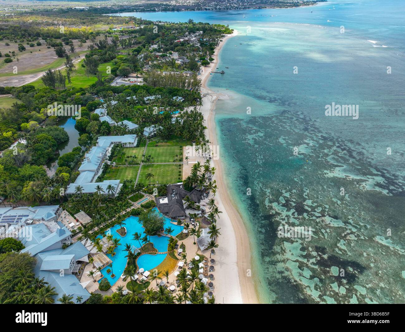 Overhead view of a beachfront resort in Flic en Flac, Mauritius with ...