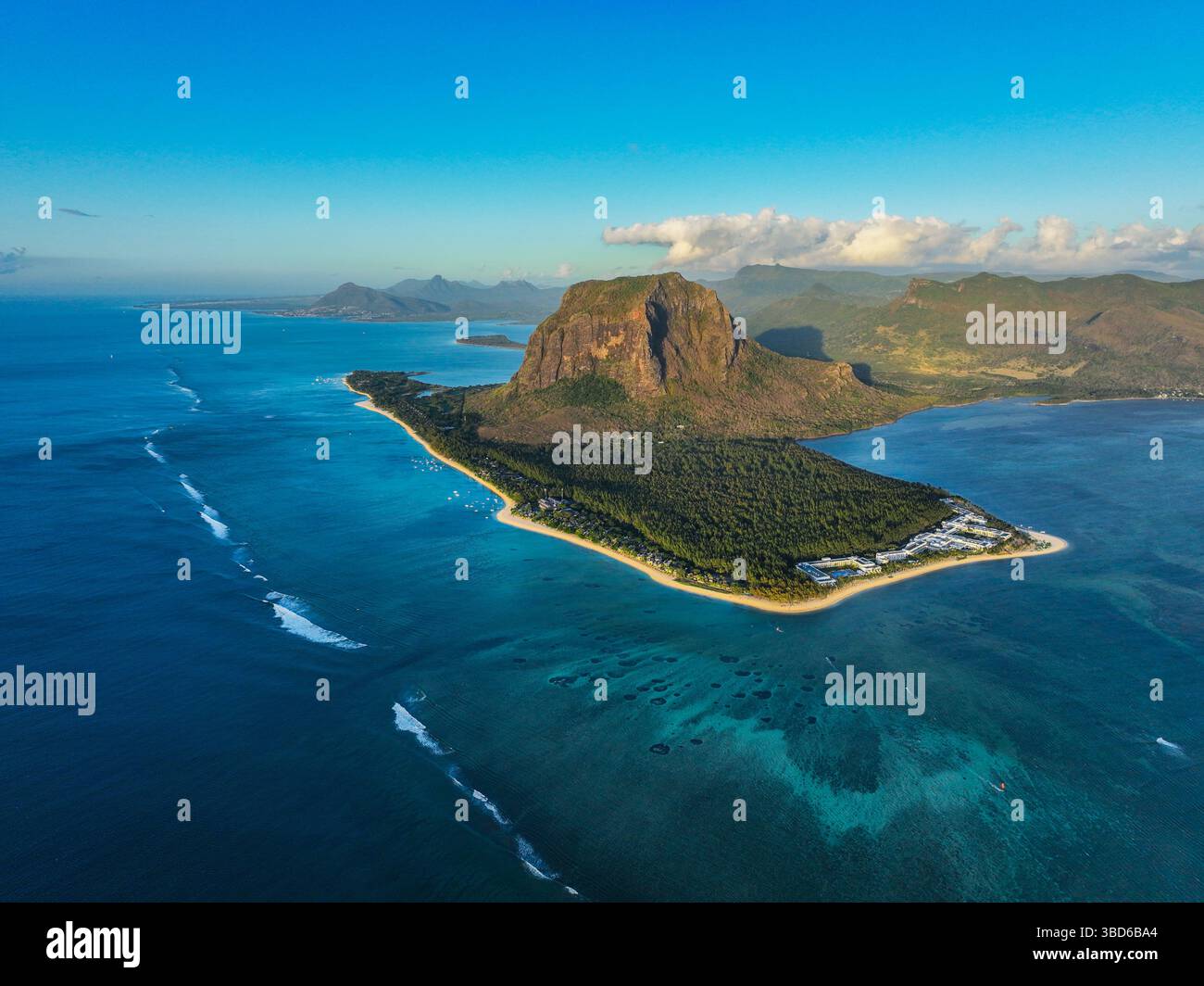 A sweeping aerial captures the full peninsula of Le Morne, Mauritius ...