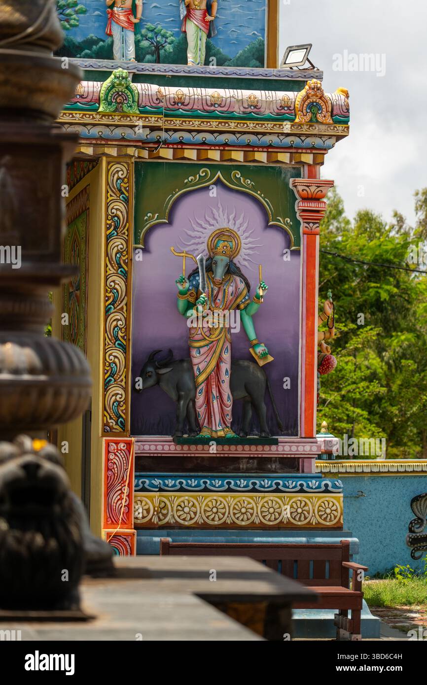 Cap Malheureux, Mauritius - May 12, 2024: A vividly painted statue of a ...