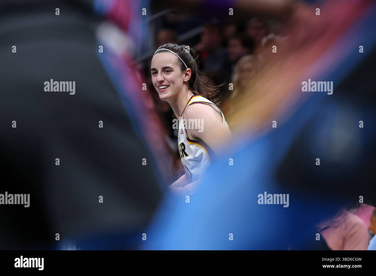 Indiana Fever guard Caitlin Clark reacts after making a three-pointer ...