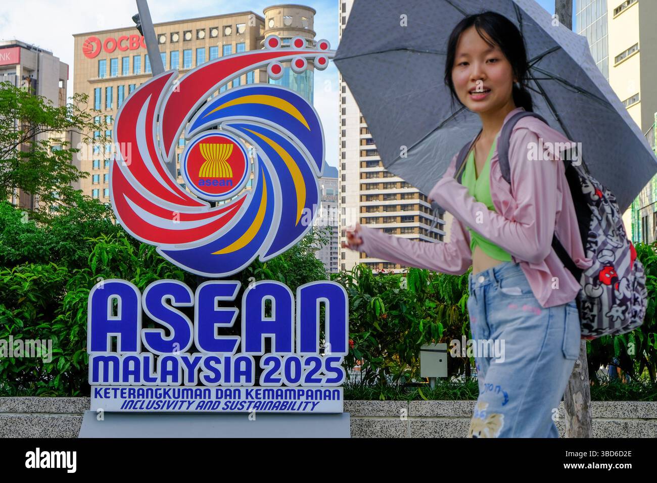 Kuala Lumpur, Malaysia. 22nd May, 2025. A woman seen passing by a ...