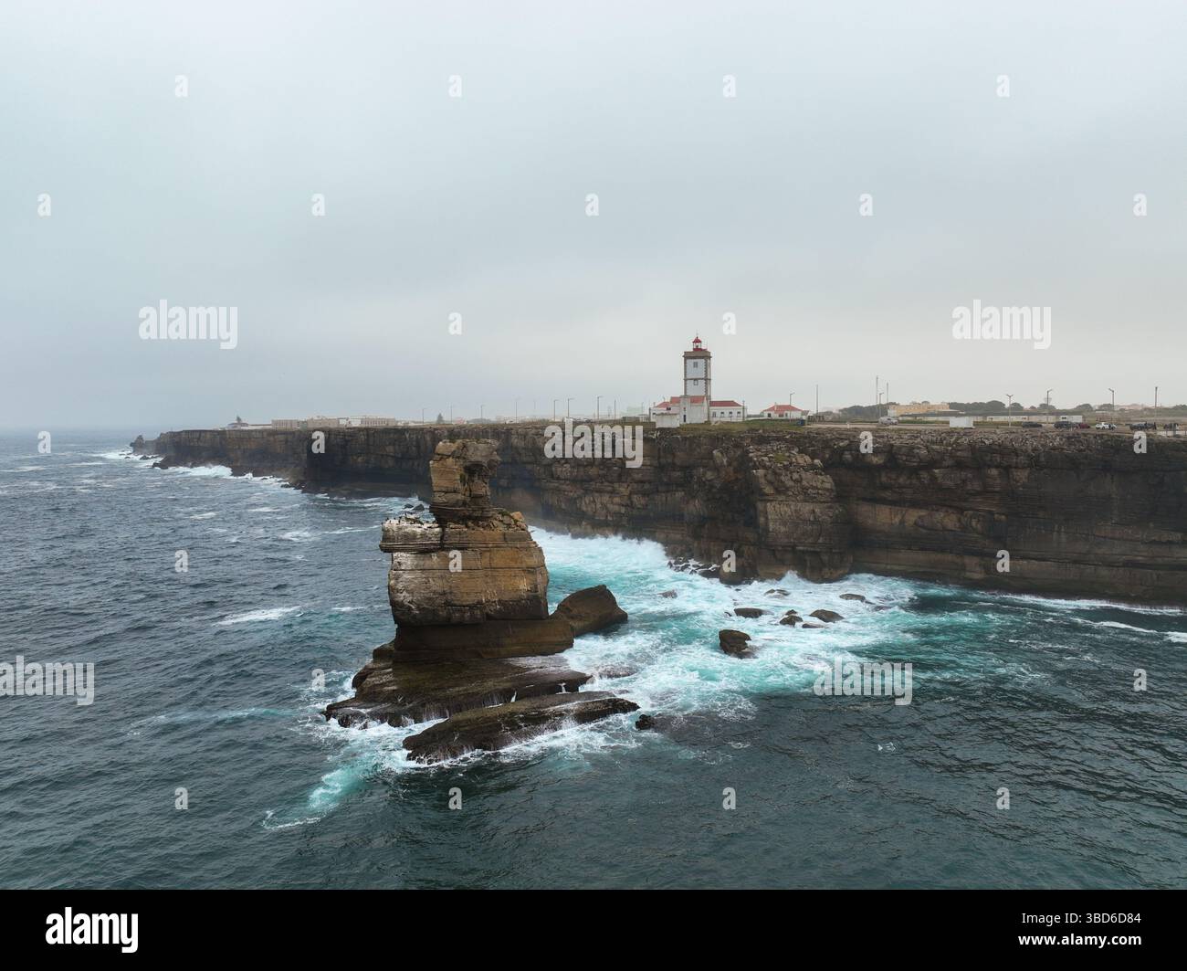 Rock stack formation with Cabo Carvoeiro Lighthouse in background Stock ...