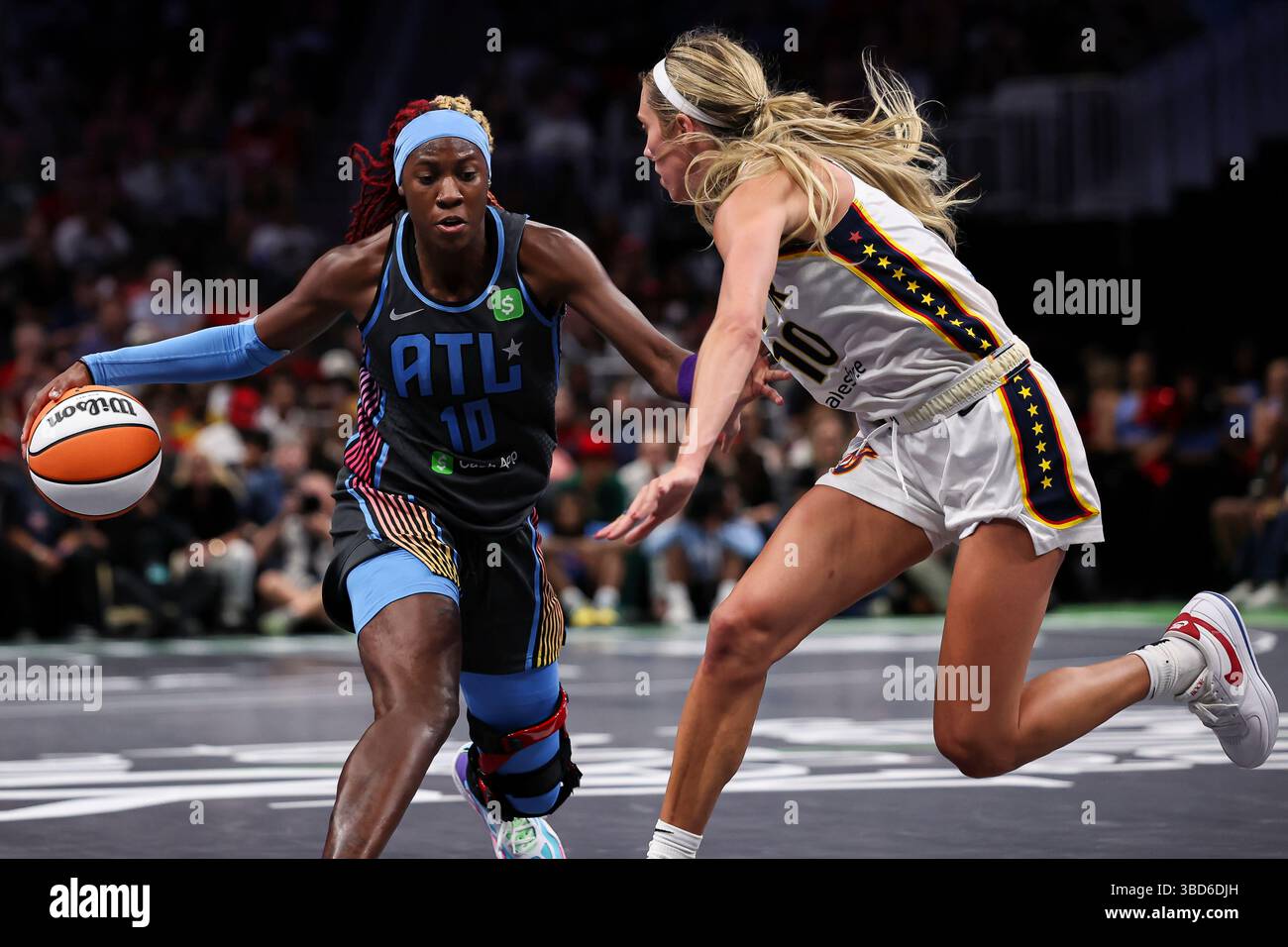 Atlanta Dream guard Rhyne Howard dribbles the ball against Indiana ...