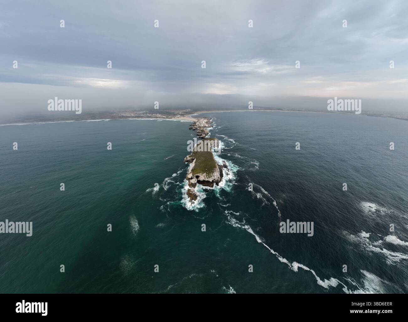 Wide angle view of Baleal town and cliffs with cloudy sky and vast ...